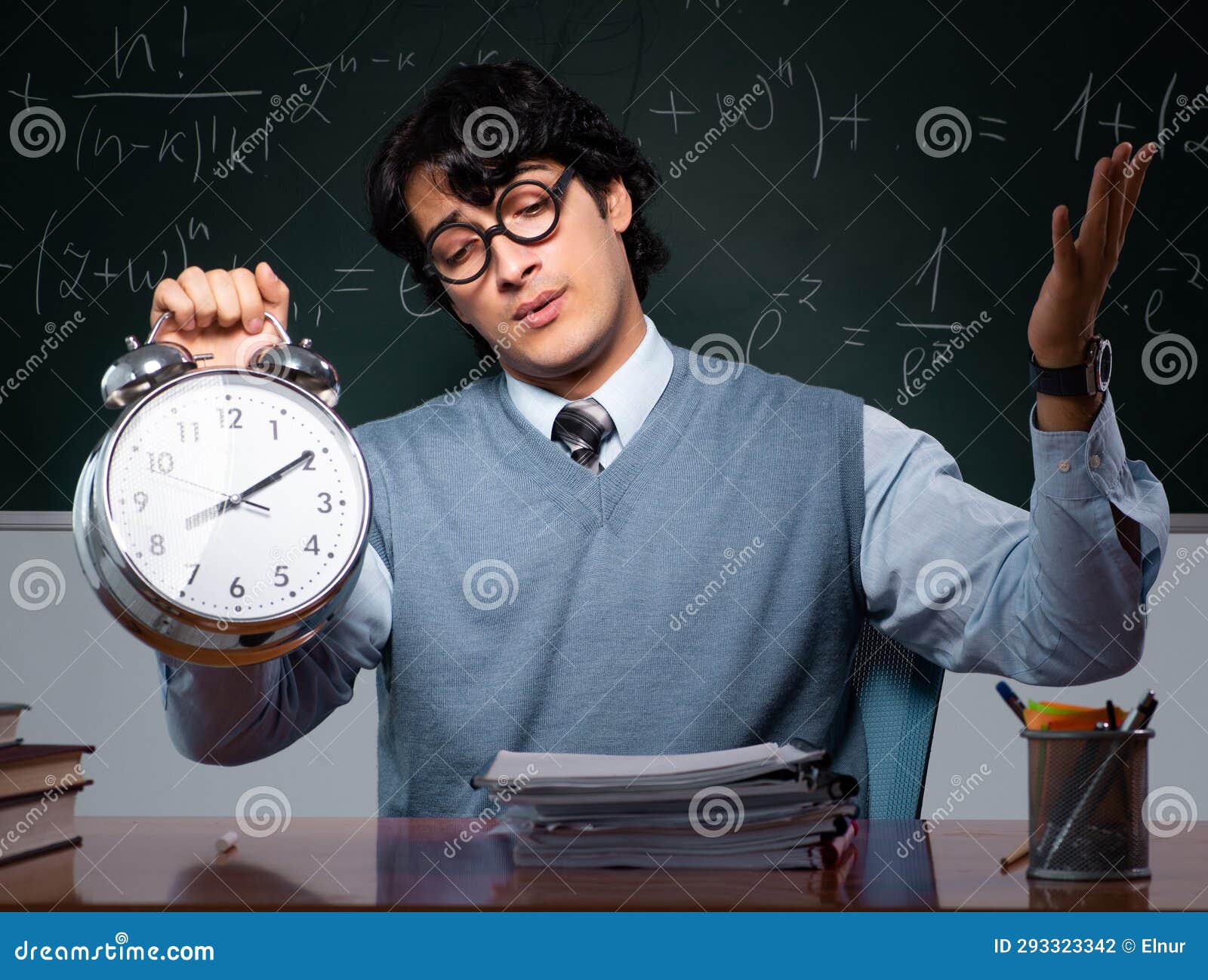 Young Math Teacher in Front of Chalkboard Stock Photo - Image of class ...