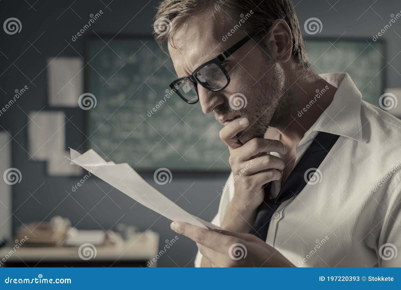 Young Mathematician Studying in His Office and Reading Papers Stock ...