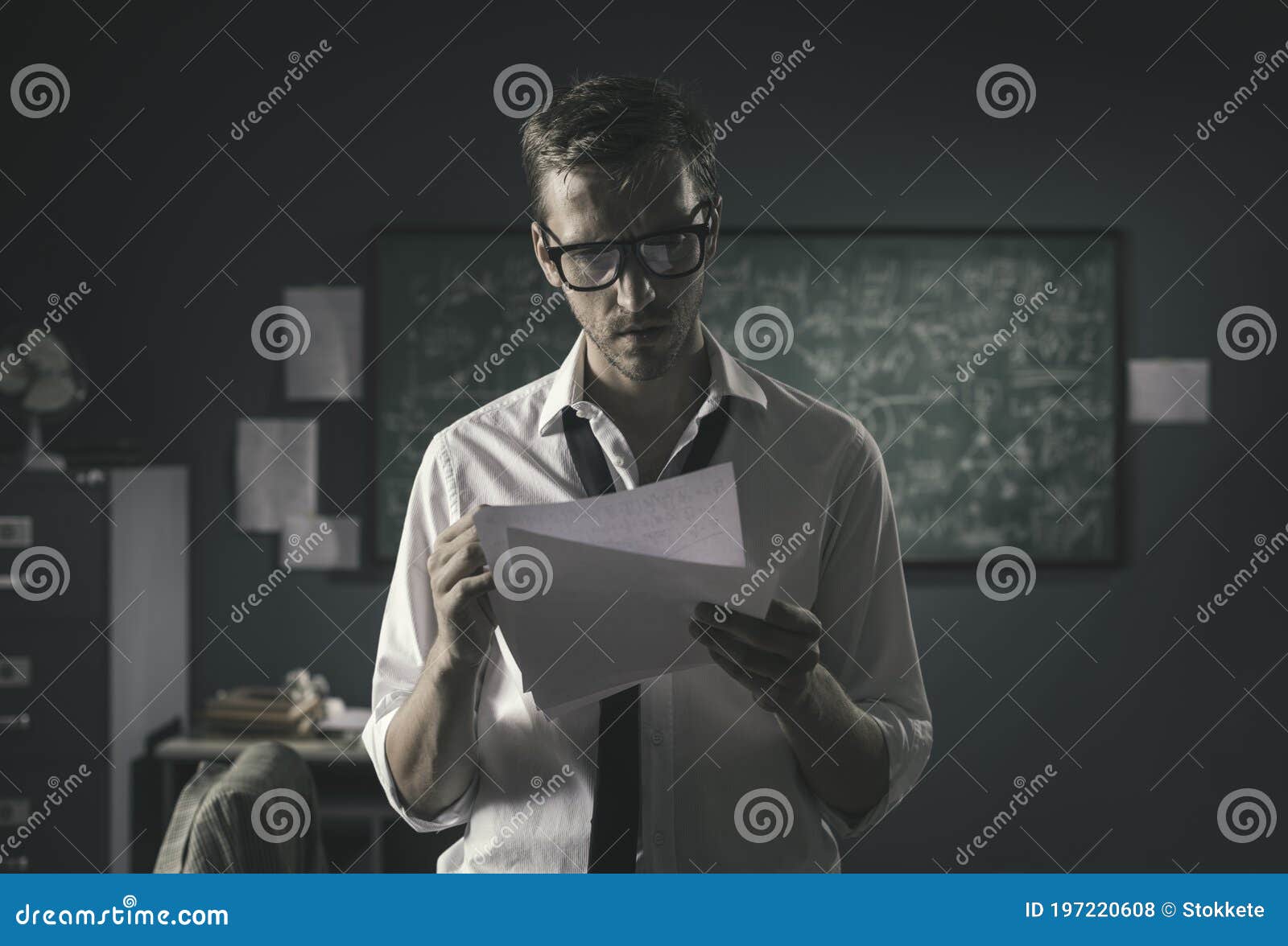 Young Mathematician Studying in His Office and Reading Papers Stock ...
