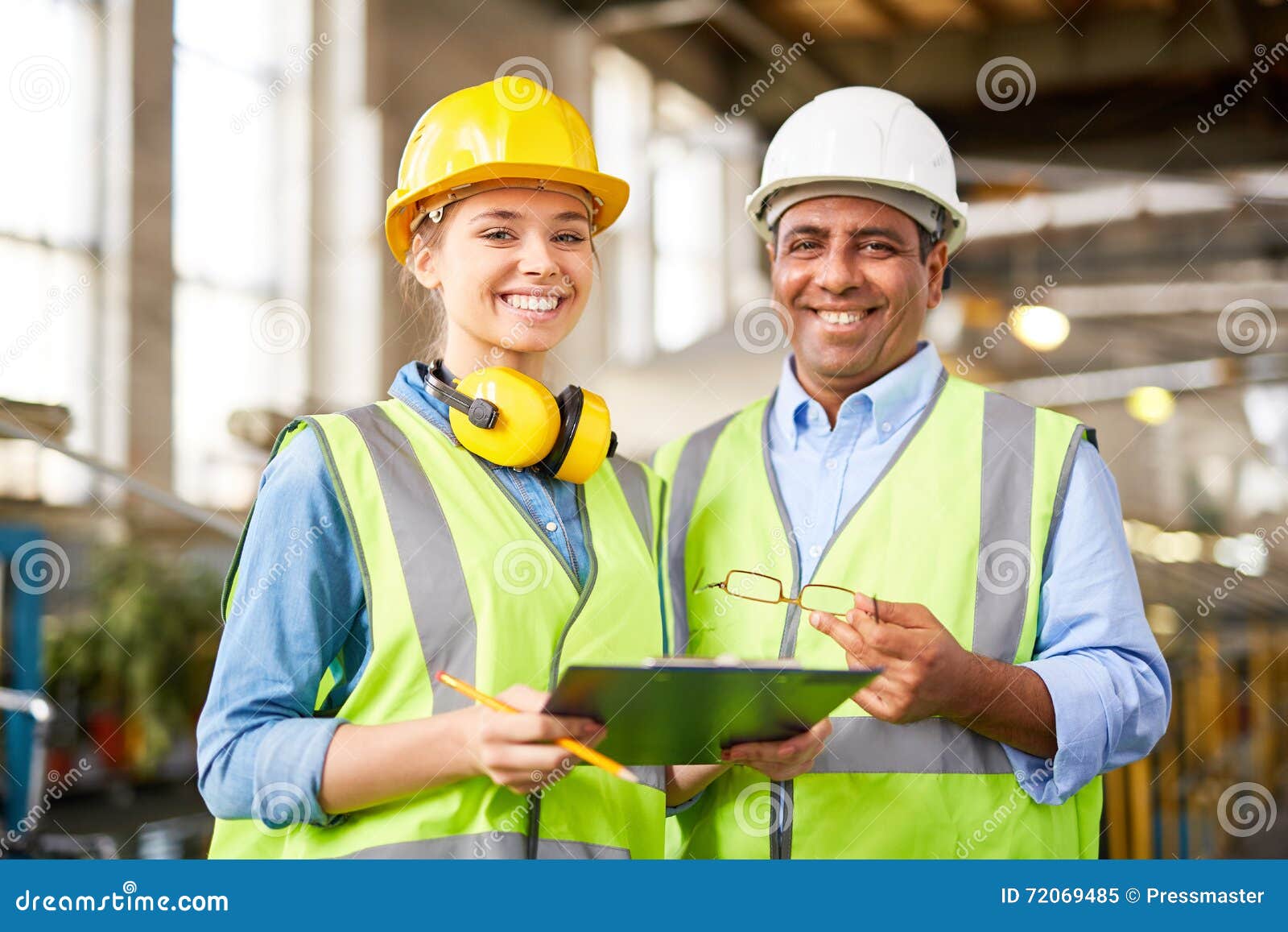 Young and mature engineers stock image. Image of factory - 72069485