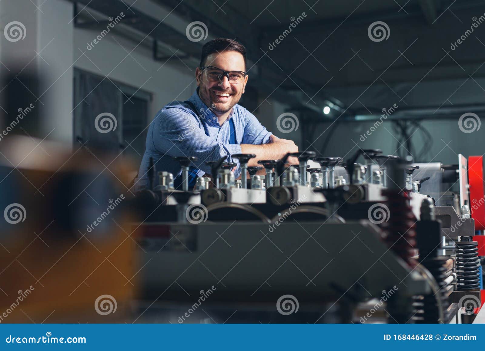 Mechanical Engineer Working on Machines. Stock Photo - Image of ...