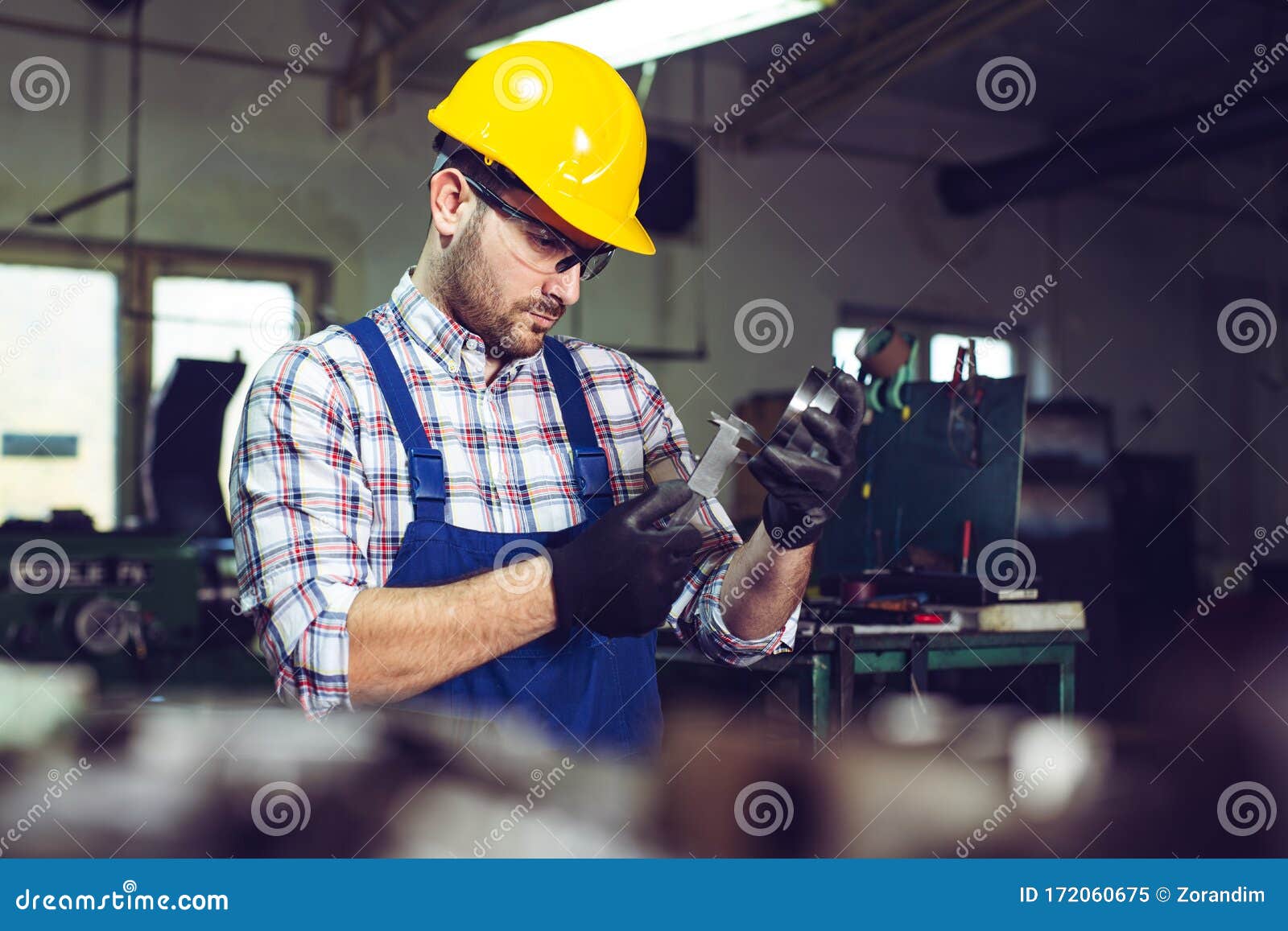 Mechanical Technician Measuring with Caliper in Workshop Stock Image ...