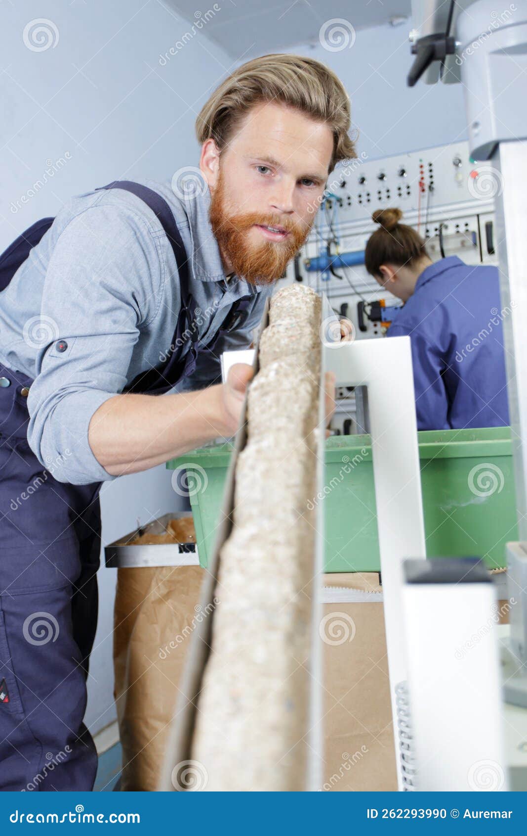 Young Mechanical Worker Looking at Machine Stock Photo - Image of ...