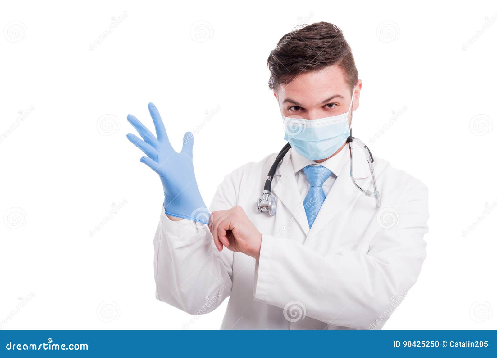 Young Medic Pulling on Medical Gloves Stock Photo - Image of ...