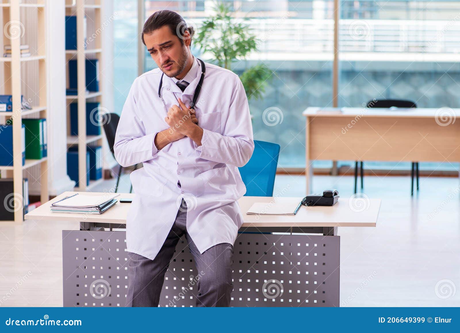 Young Male Medic Working in the Clinic Stock Image - Image of exhausted ...