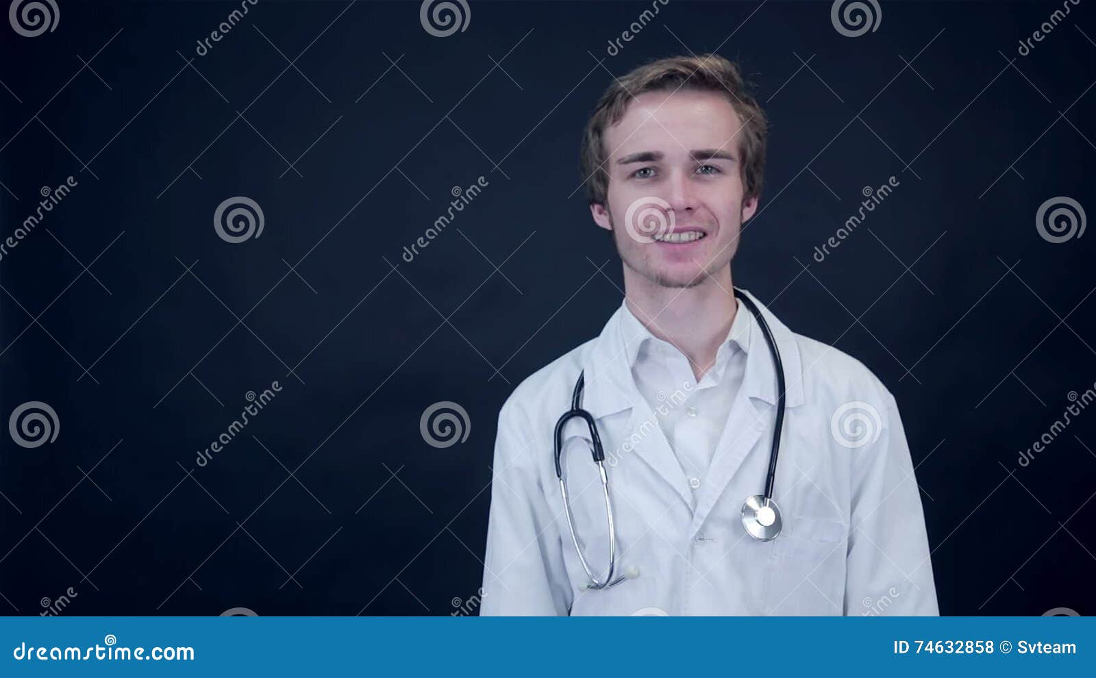 Young Medical Doctor Looking into Camera, Smiling. Packshoot Stock ...
