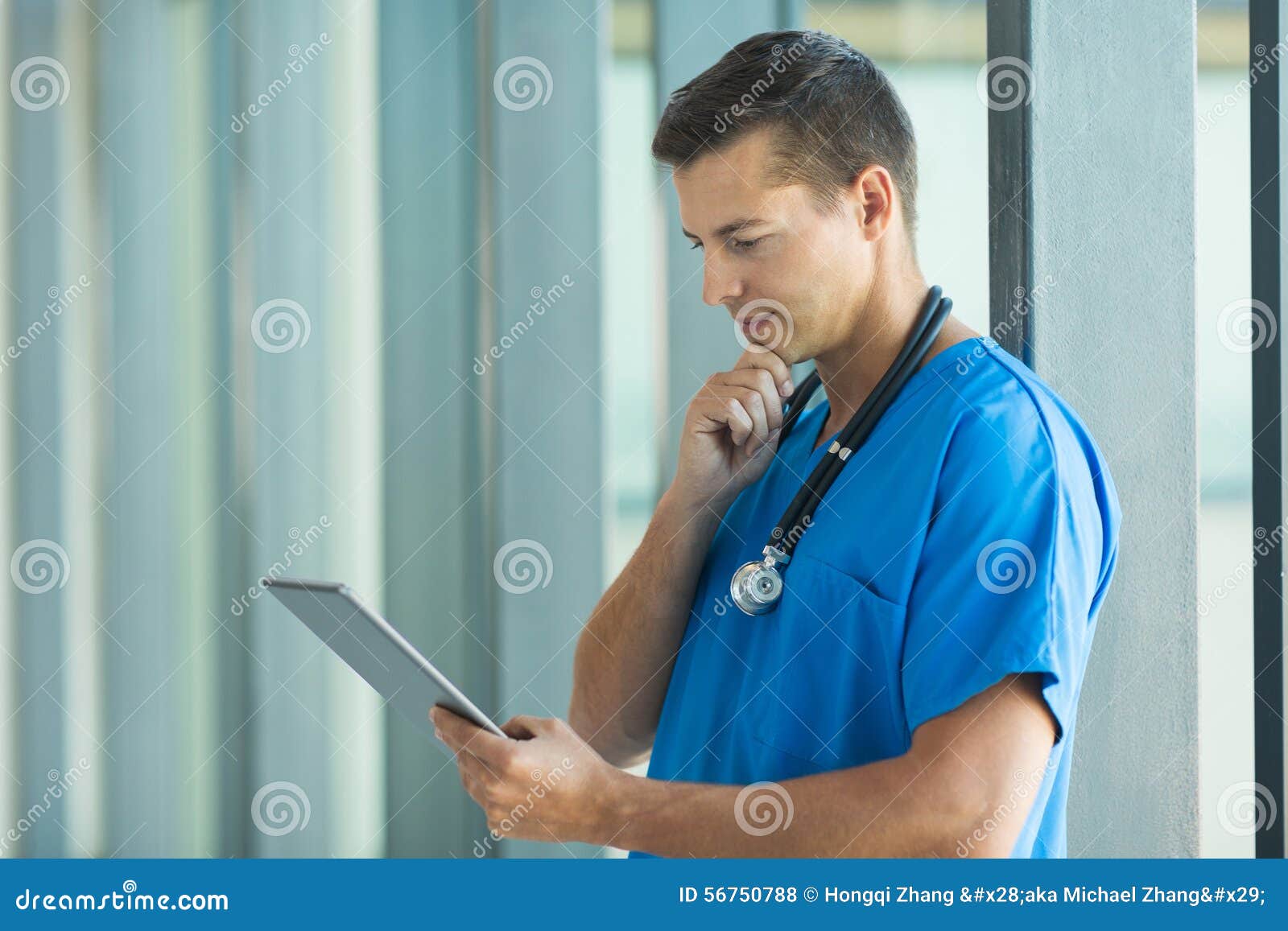 Young medical intern stock photo. Image of intern, holding - 56750788