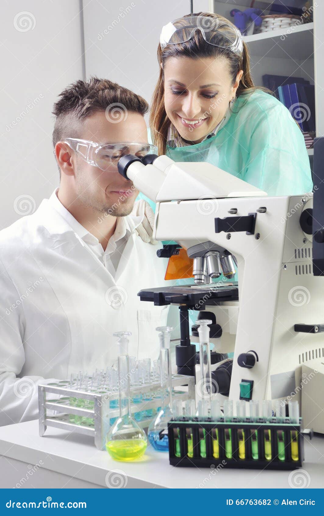 Young Medical Scientists Studying New Substance or Virus with ...