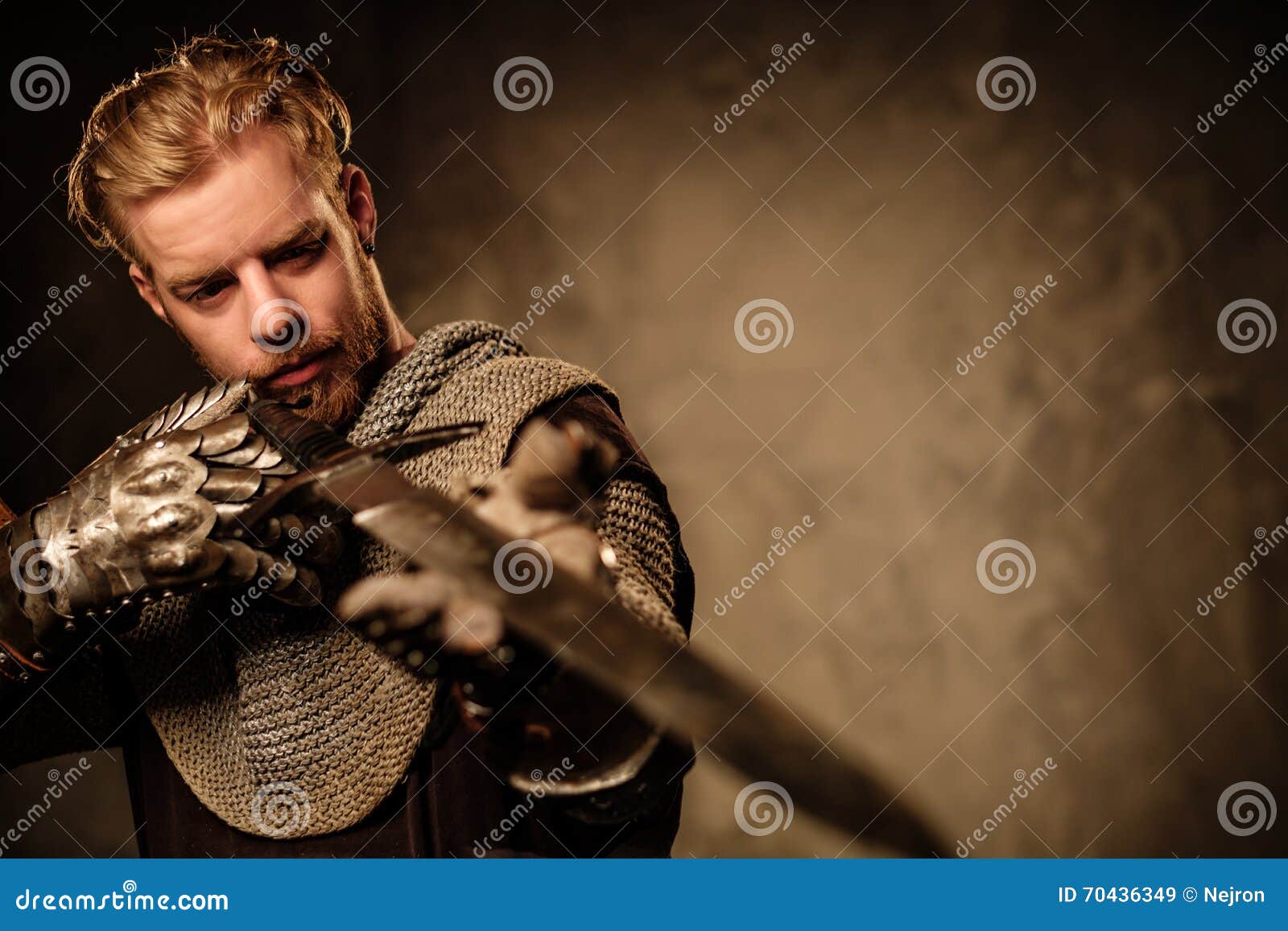 Young Medieval Knight Posing on Dark Background. Stock Image - Image of ...