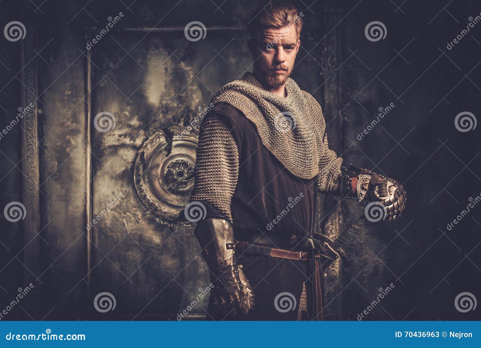 A Medieval Knight In Full Armor Holds In His Hands A Human Skull ...