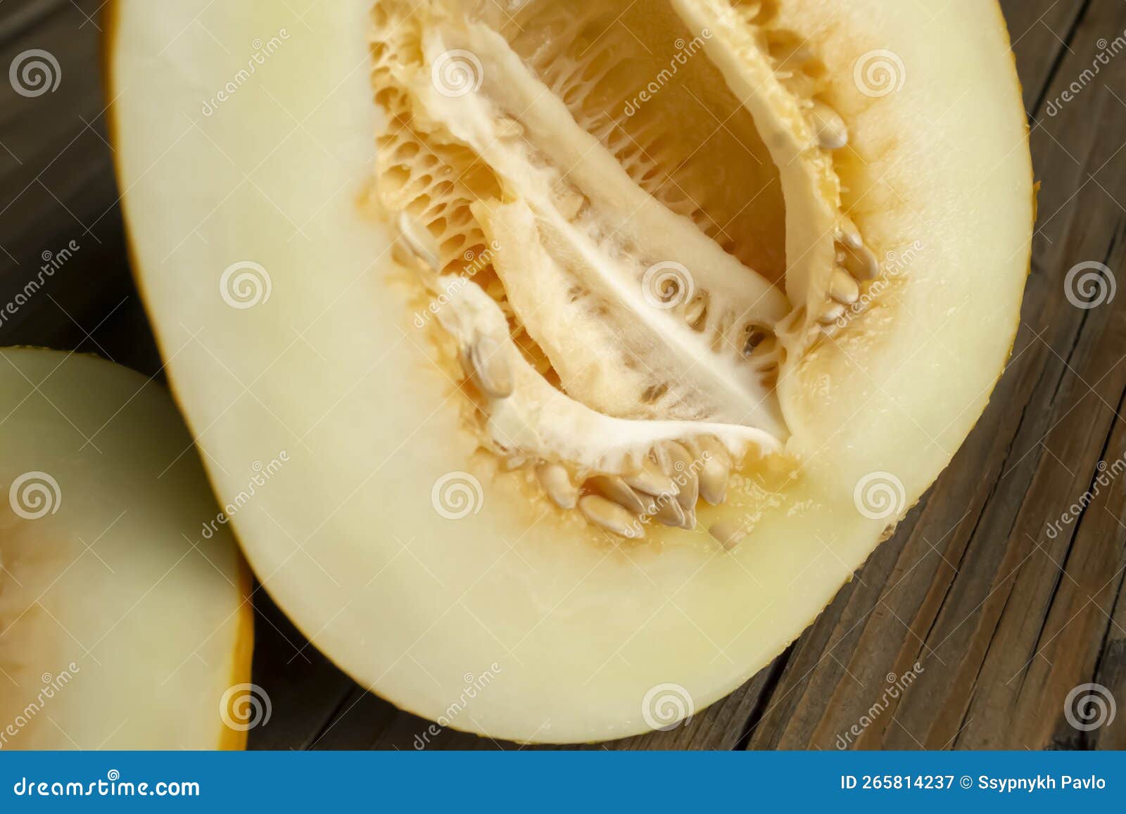 A Young Melon Close-up. Slicing Melon, Peeling from Grains. Cut Melon ...