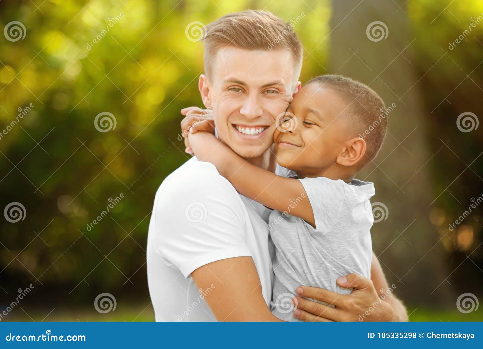 Young Man with Adopted African American Boy Stock Photo - Image of ...
