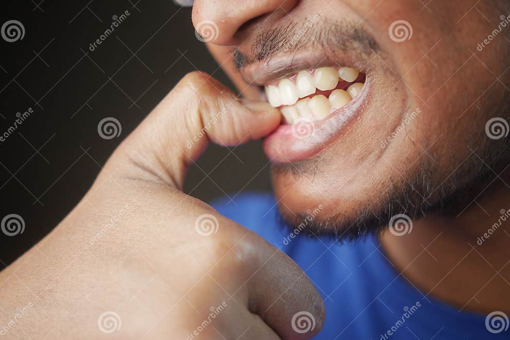 Young Men Biting His Nails at Home, Stock Image - Image of expression ...