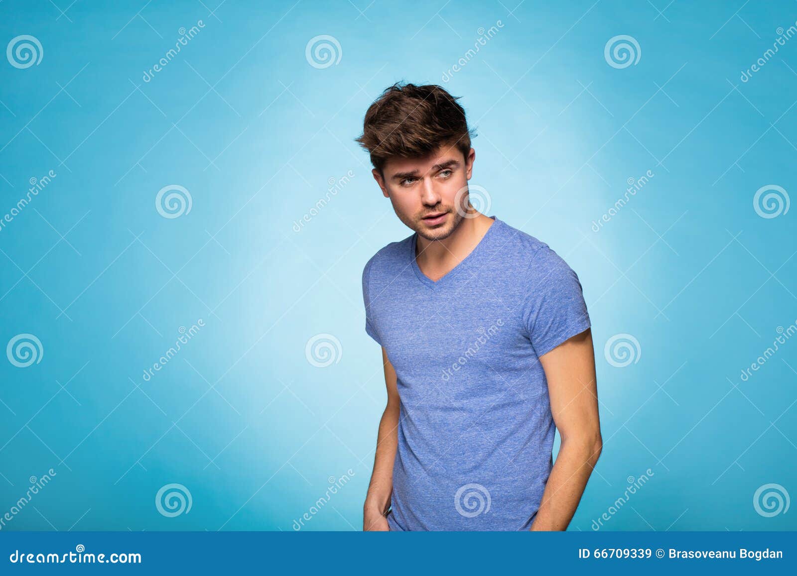 Young Men on Blue Background Stock Image - Image of brown, attractive ...