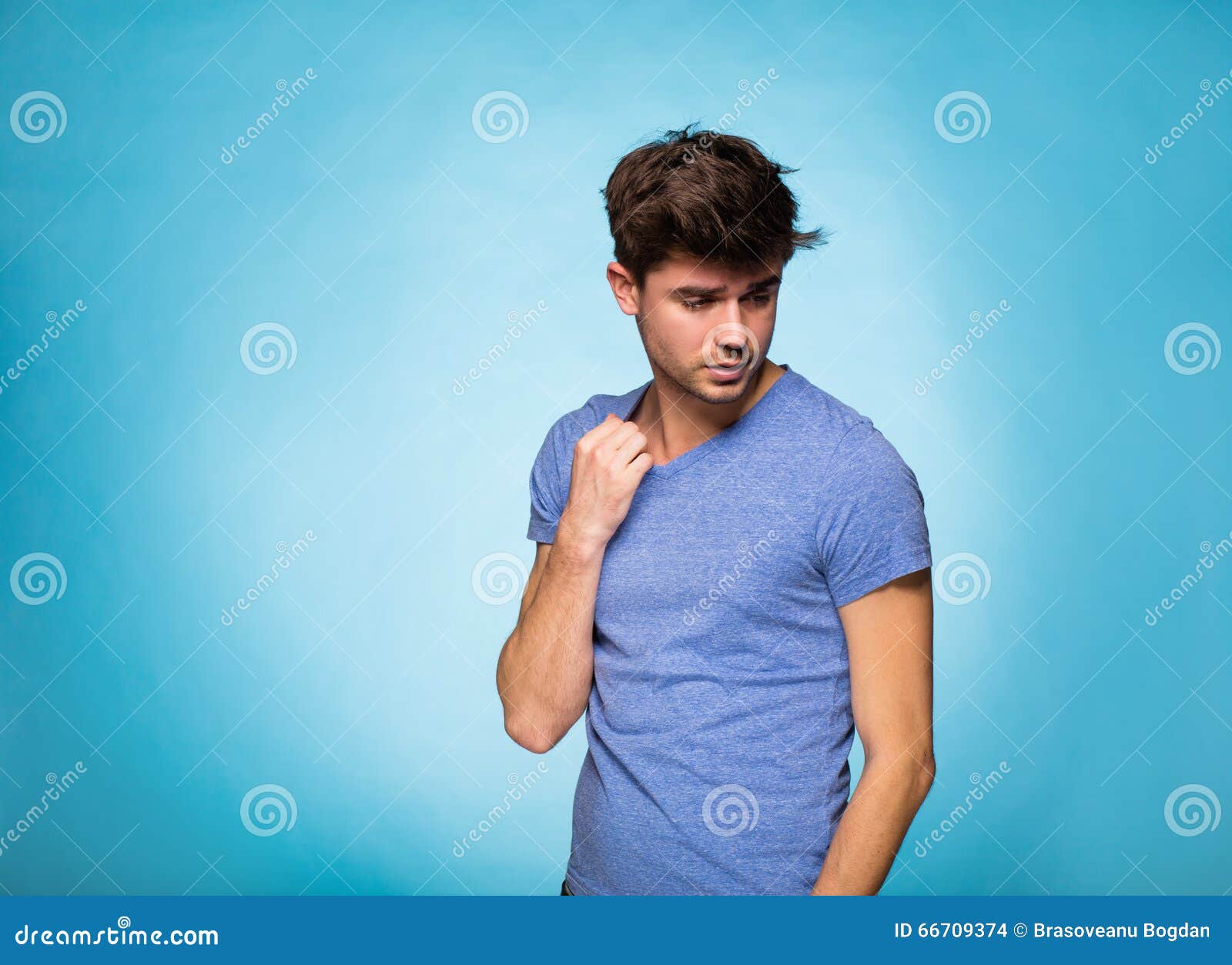 Young Men on Blue Background Stock Photo - Image of crossed, copy: 66709374