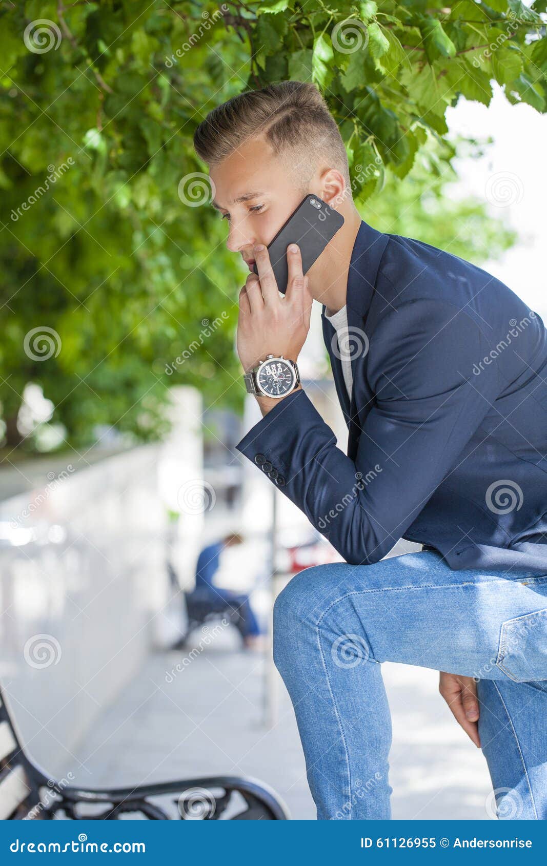 Young men calling by phone stock image. Image of handsome - 61126955