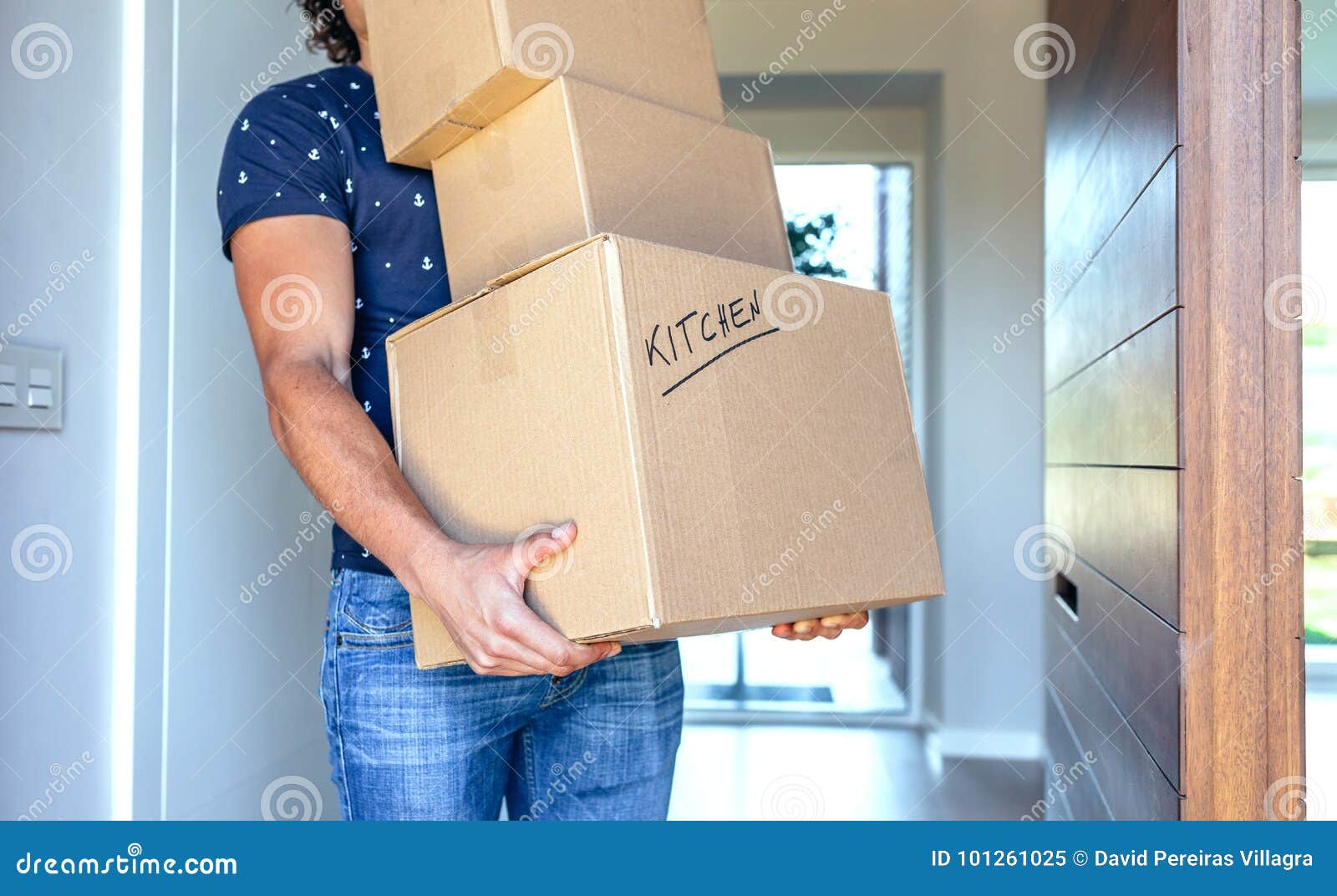 Man carrying moving boxes stock image. Image of morgage - 101261025