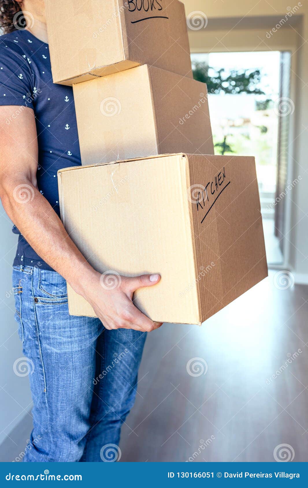 Man carrying moving boxes stock image. Image of morgage - 130166051