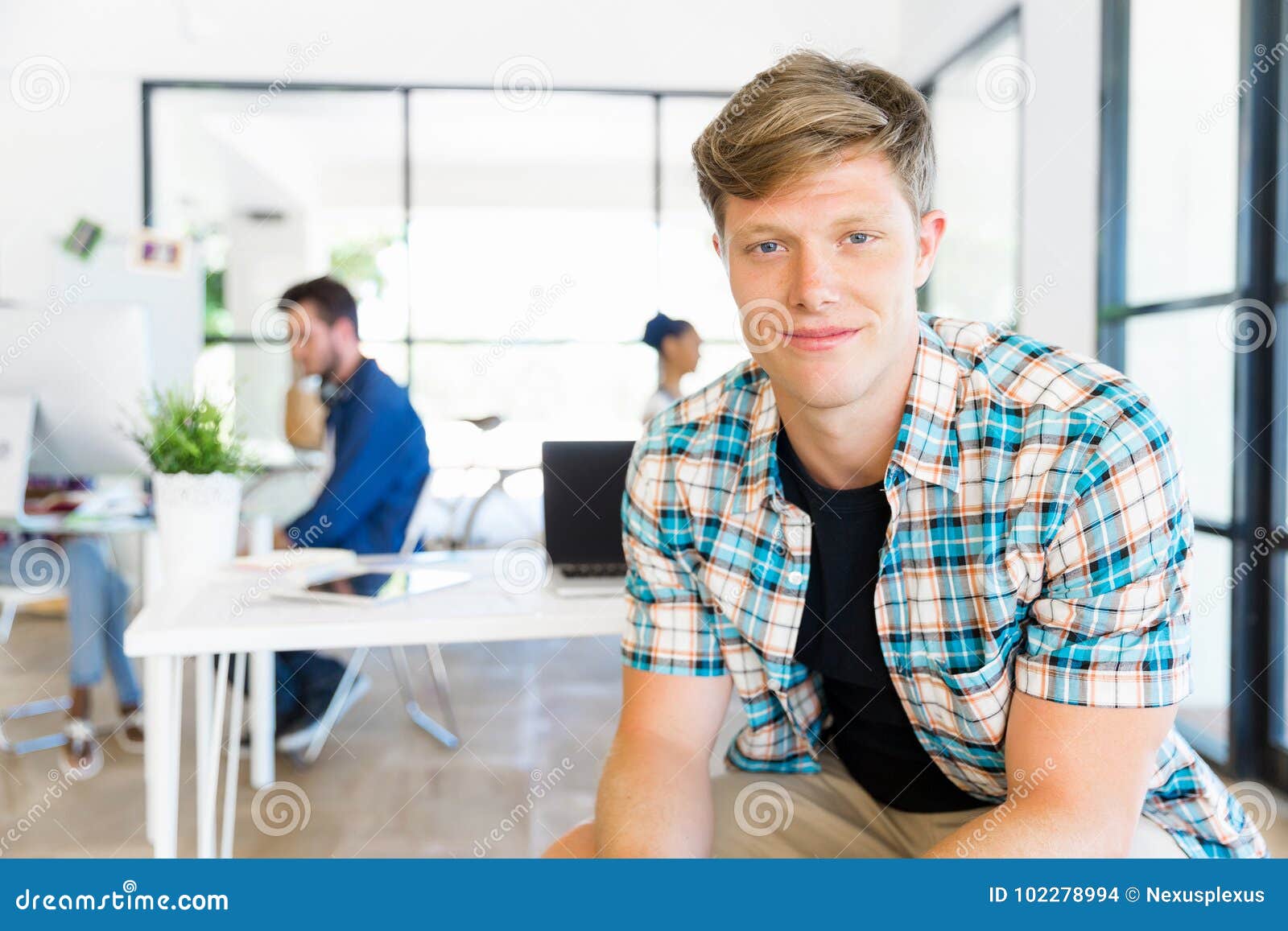 Young Man Working in Office Stock Photo - Image of office, business ...