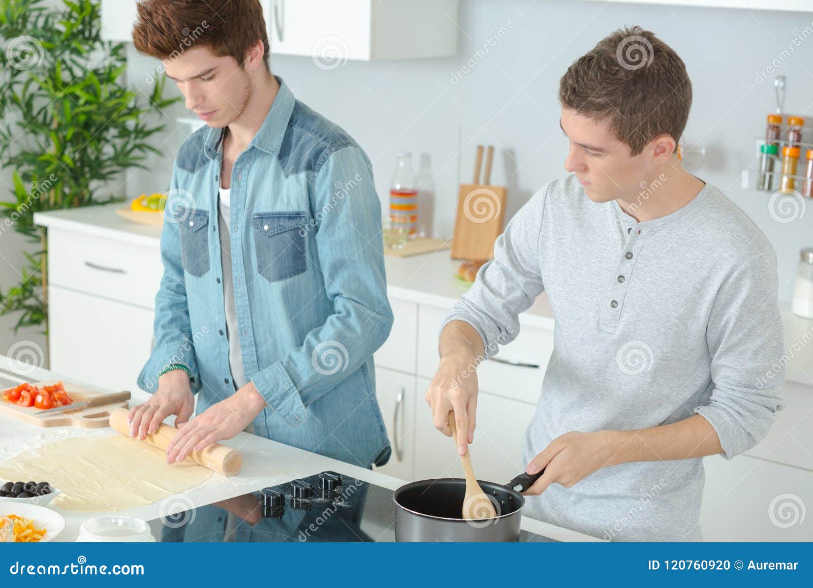Young Men Cooking in Kitchen Stock Photo - Image of confectionery ...