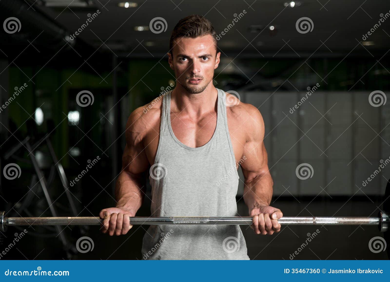 Young Men Doing Heavy Barbell Exercise Stock Photo - Image of health ...