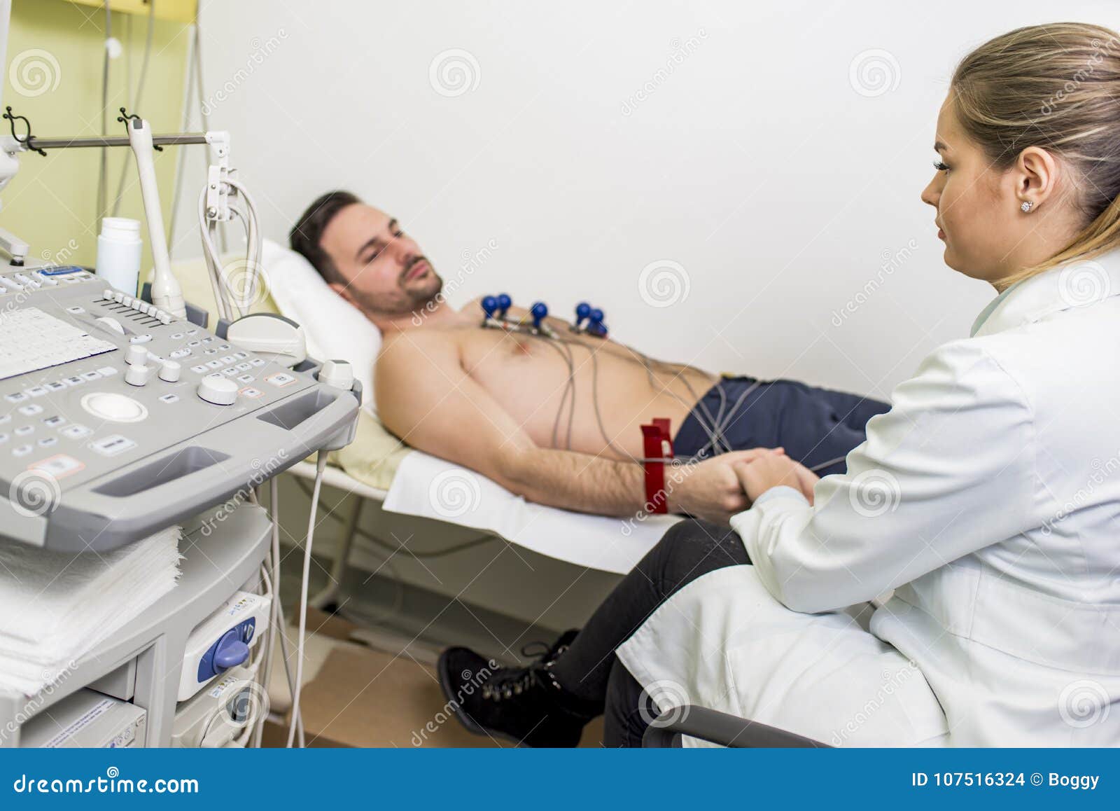 Young Man Doing EKG in Hospital Stock Photo - Image of health, patient ...