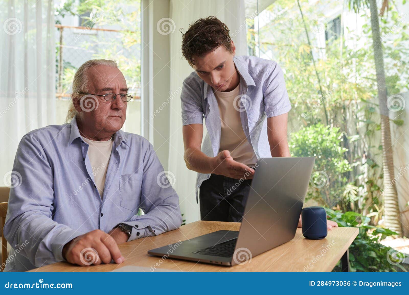 Explaining Dad How To Use Applications Stock Photo - Image of teach ...