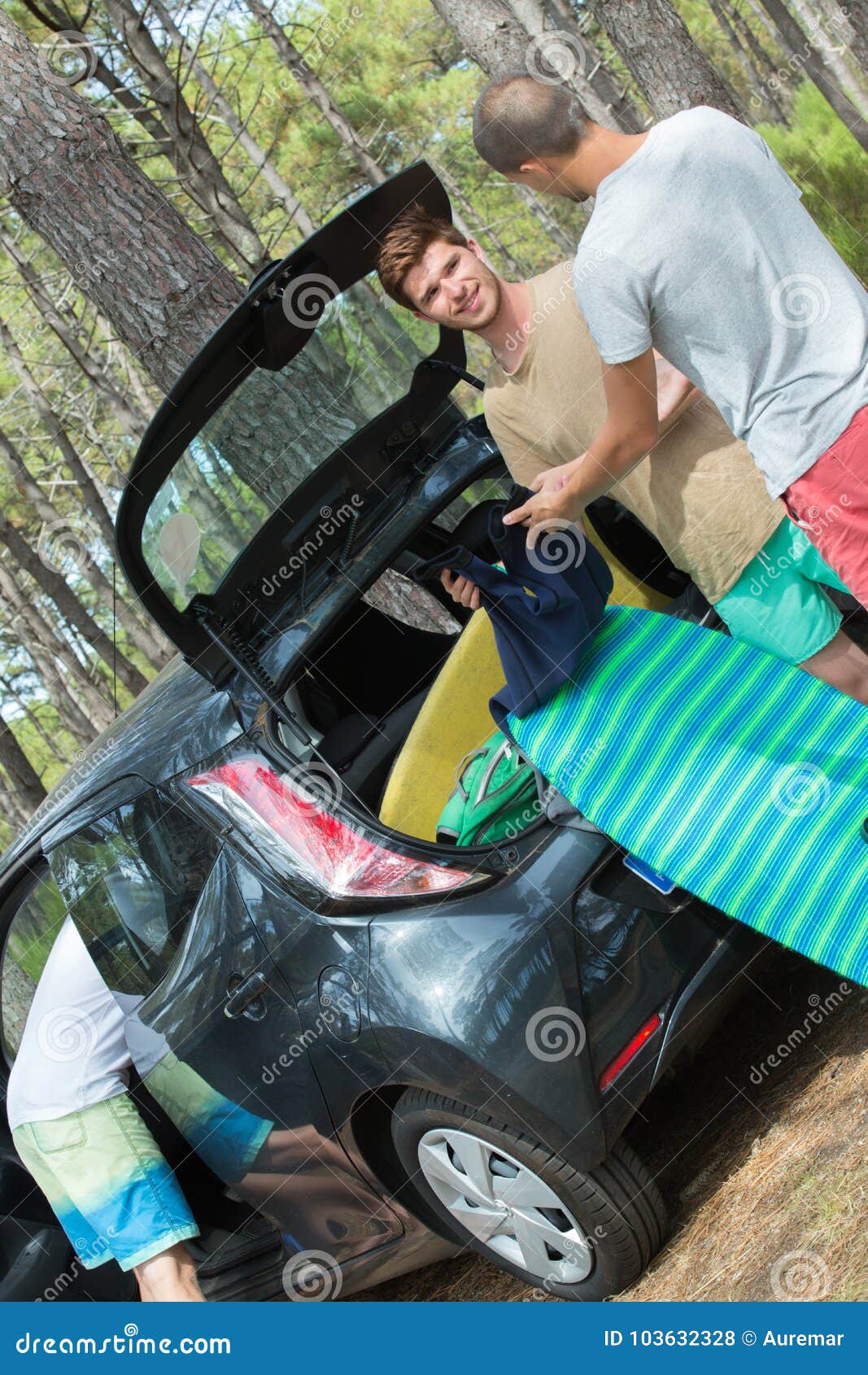 Young men getting out car stock photo. Image of summer - 103632328