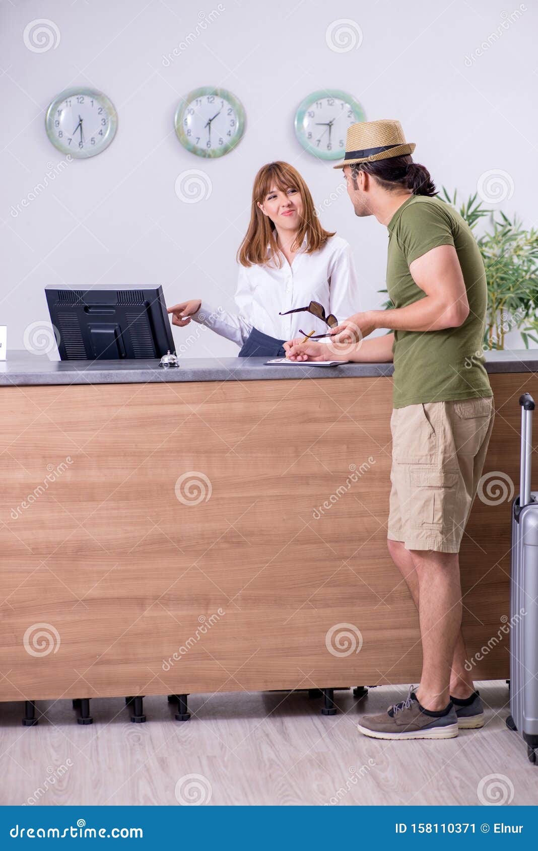 Young Man at the Hotel Reception Stock Image - Image of check, checkout ...