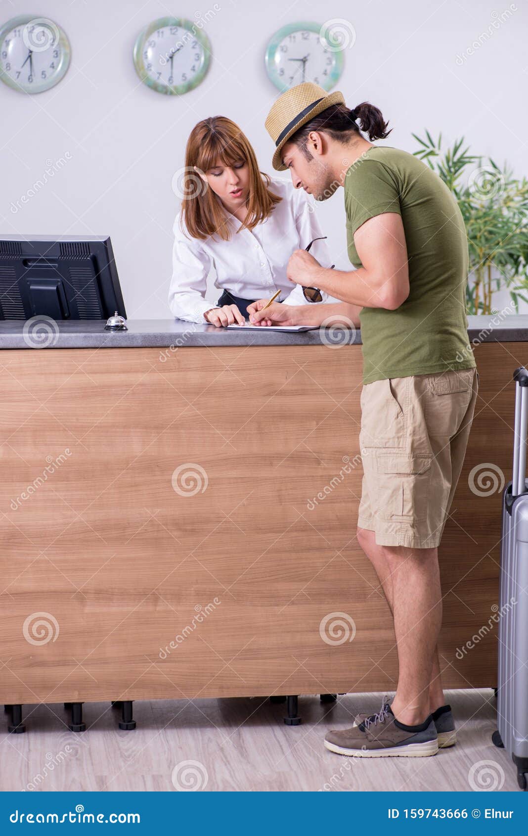 Young Man at the Hotel Reception Stock Photo - Image of lobby, checkin ...