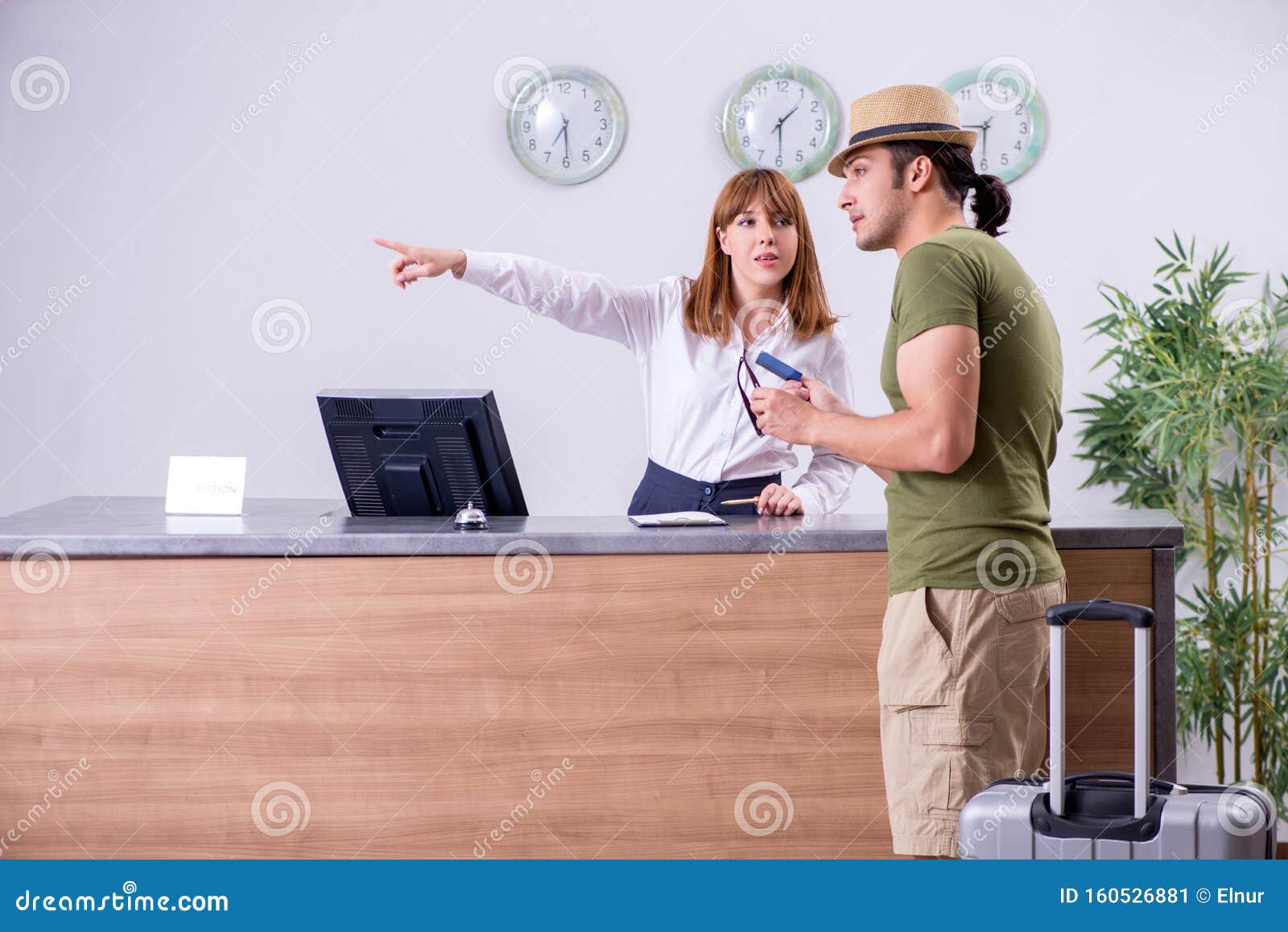 Young Man at the Hotel Reception Stock Image - Image of paying, credit ...