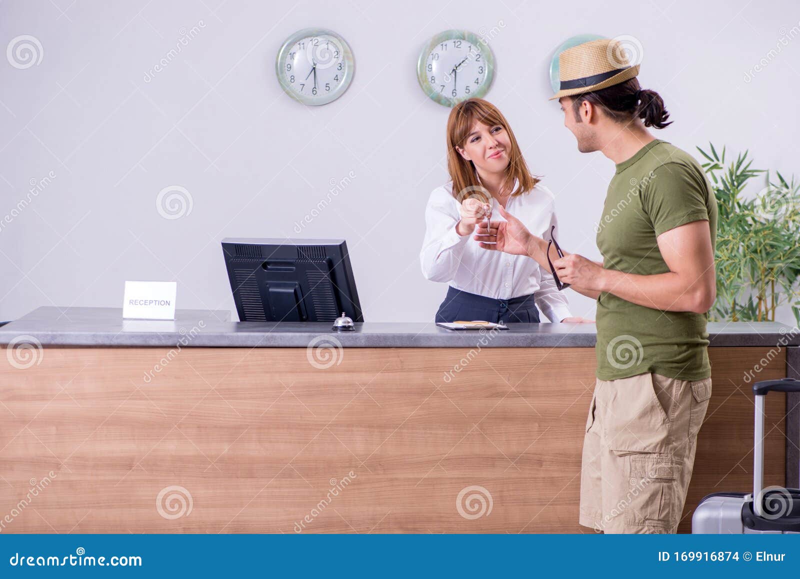 Young Man at the Hotel Reception Stock Photo - Image of booking ...