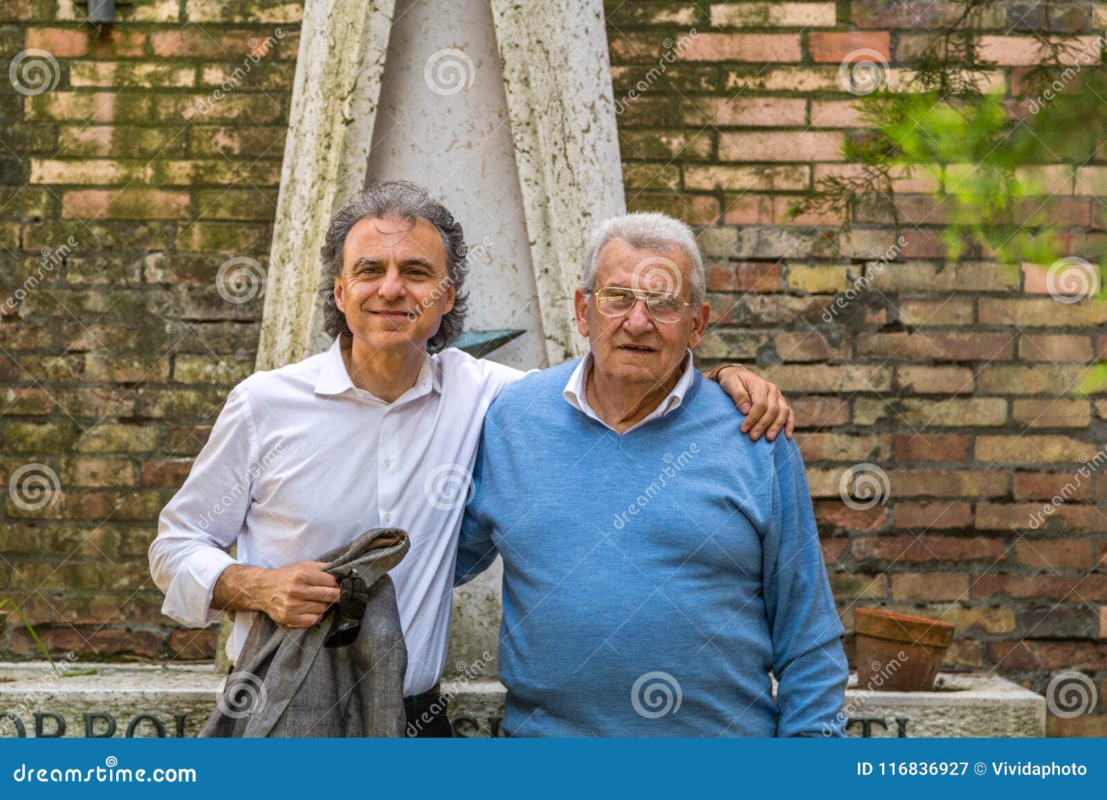 Young man hugs senior stock image. Image of love, friendship - 116836927