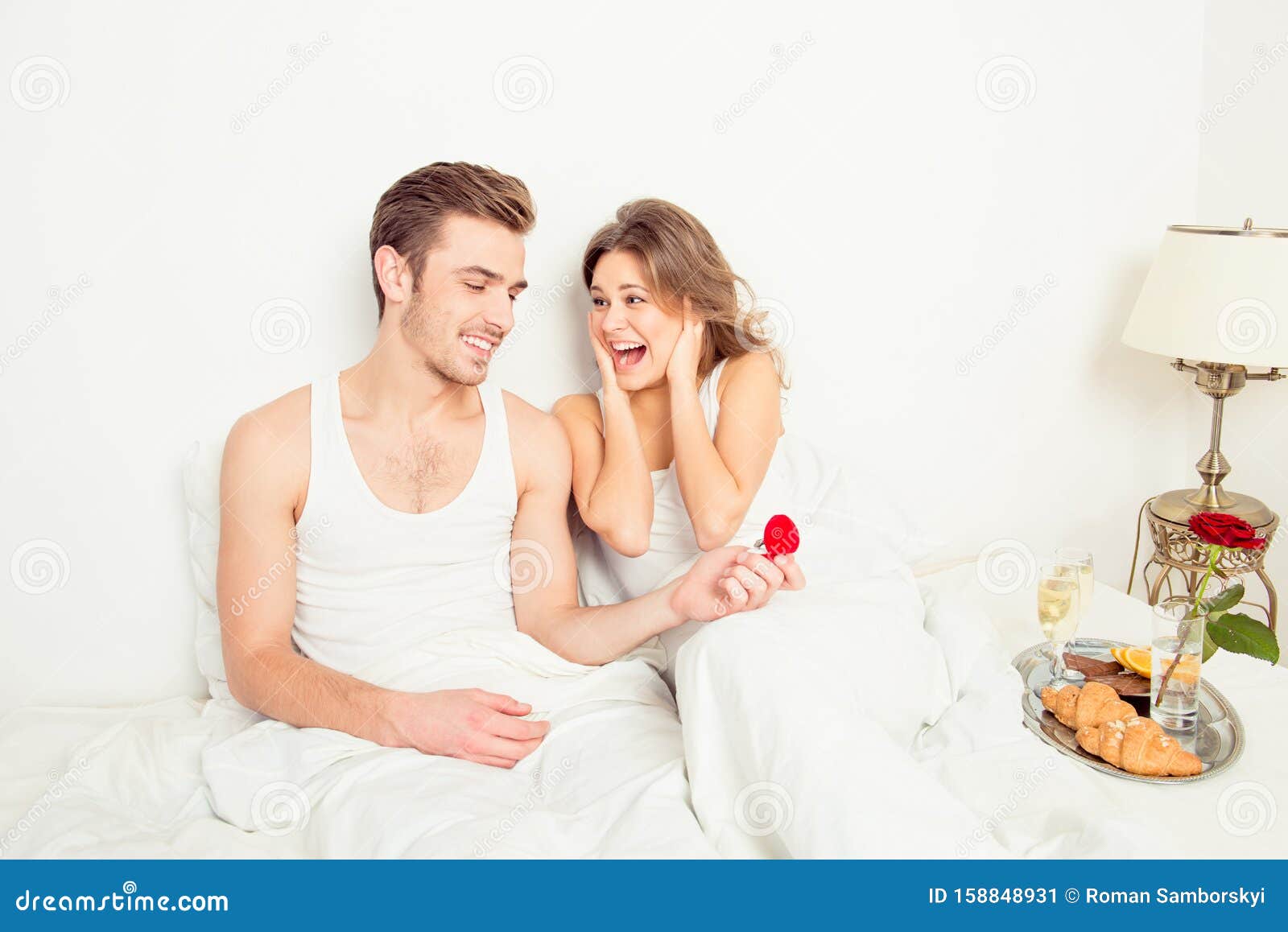 Young Man Making a Proposal in Bed Stock Image - Image of rose, ring ...