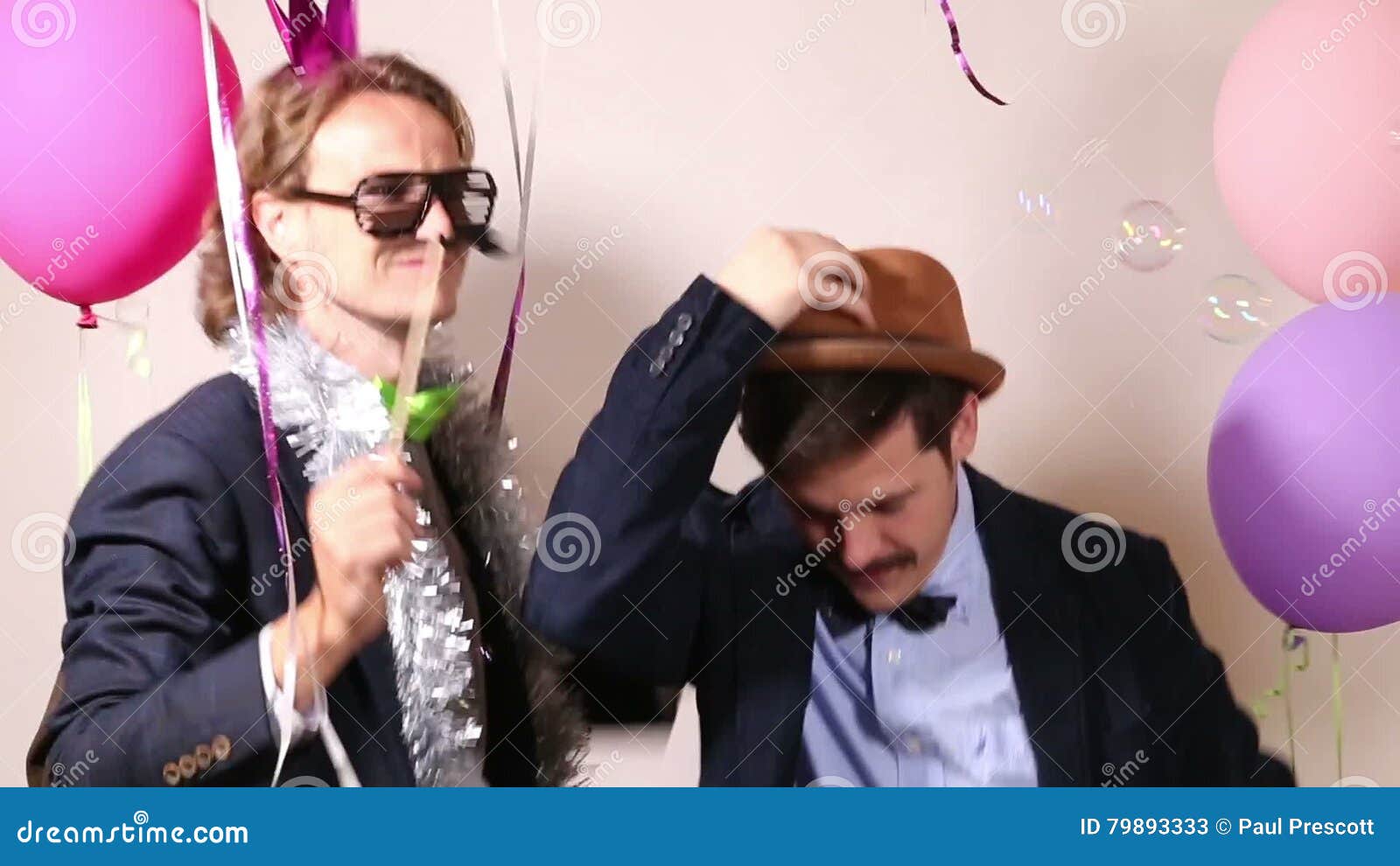 Young Men in Party Photo Booth Stock Video - Video of model, brown ...