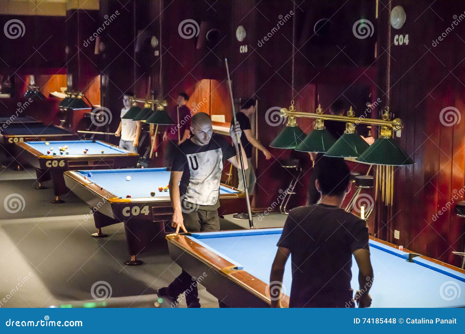 Young men play billiards editorial stock photo. Image of people - 74185448