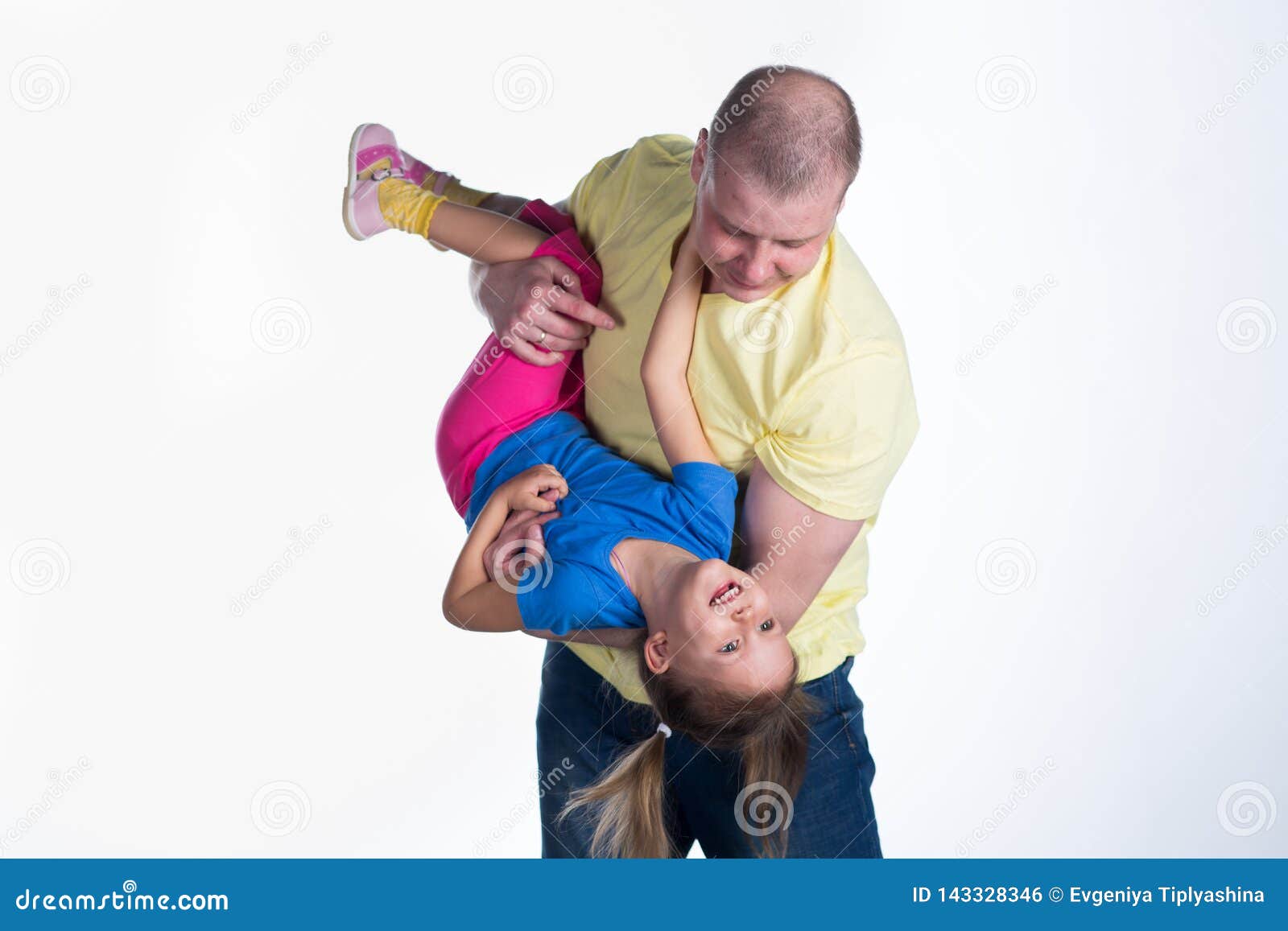 Young Man Playing with Baby Stock Photo - Image of healthy, portrait ...