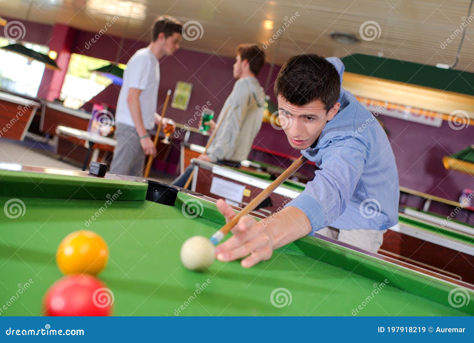 Young men playing pool stock image. Image of rack, nineball - 197918219