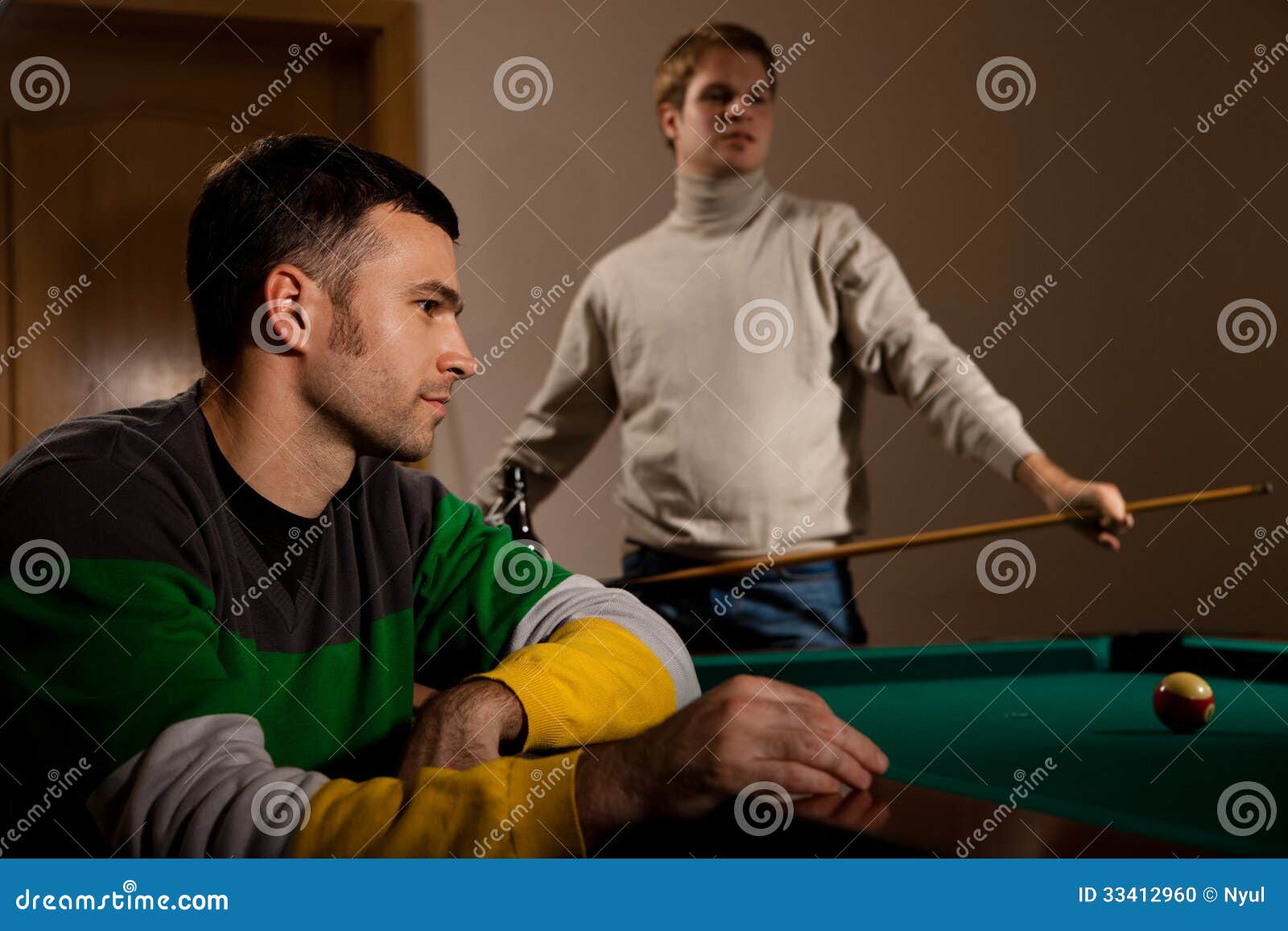 Young men playing snooker stock photo. Image of game - 33412960