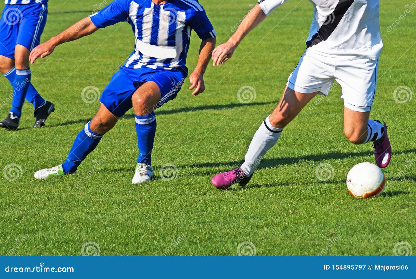 Young Men are Playing Soccer Stock Image - Image of shooting, running ...