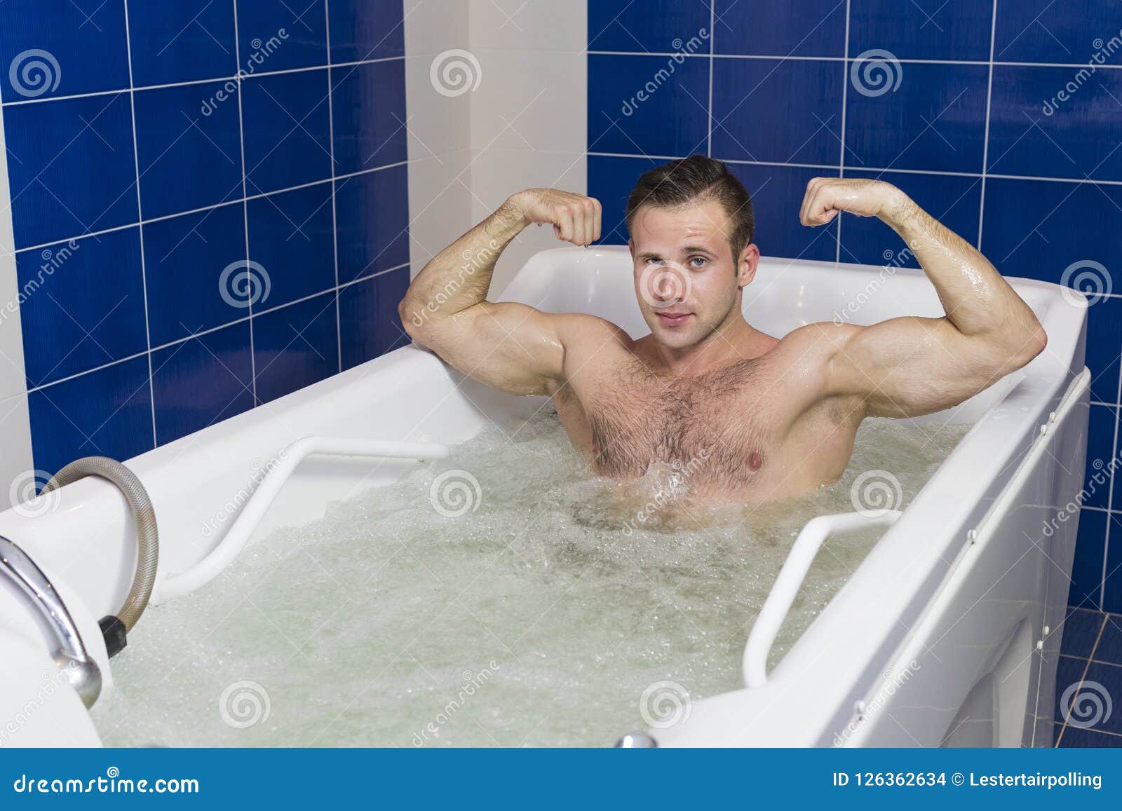 Young Man is the Procedure in the Whirlpool Hydrobath Stock Photo ...