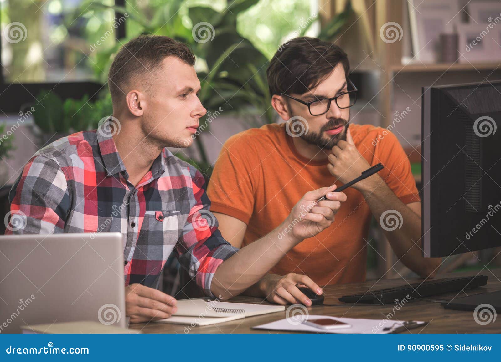 Young Men Programmers Working Together in the Office Stock Image ... Young Men Programmers Working Together in the Office Stock Image ...