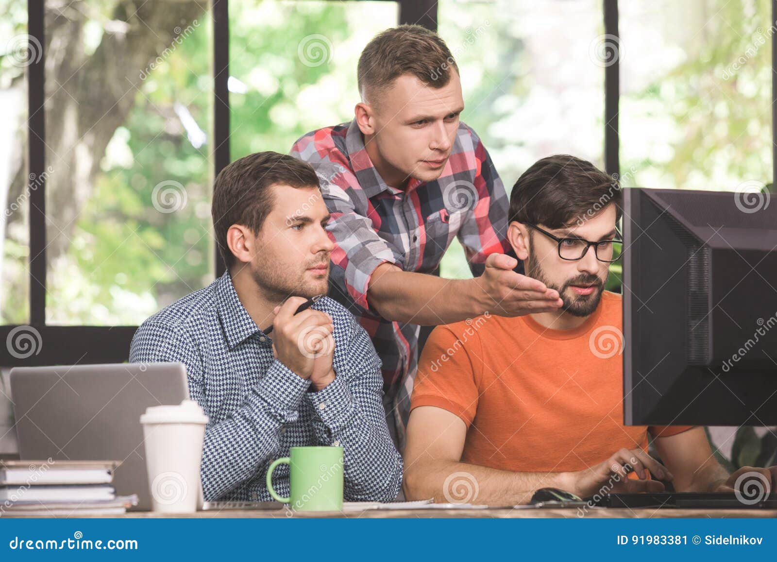 Young Men Programmers Working Together in the Office Stock Image ... Young Men Programmers Working Together in the Office Stock Image ...