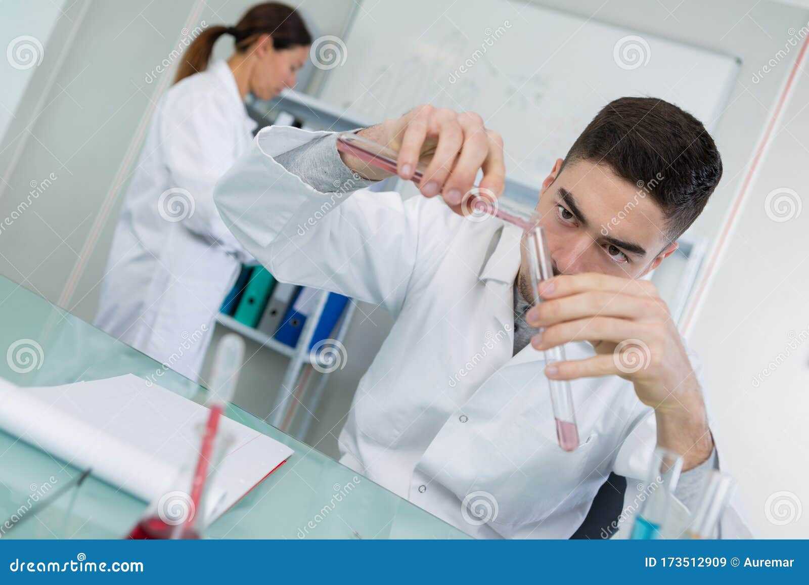 Young man in science lab stock image. Image of equipment - 173512909