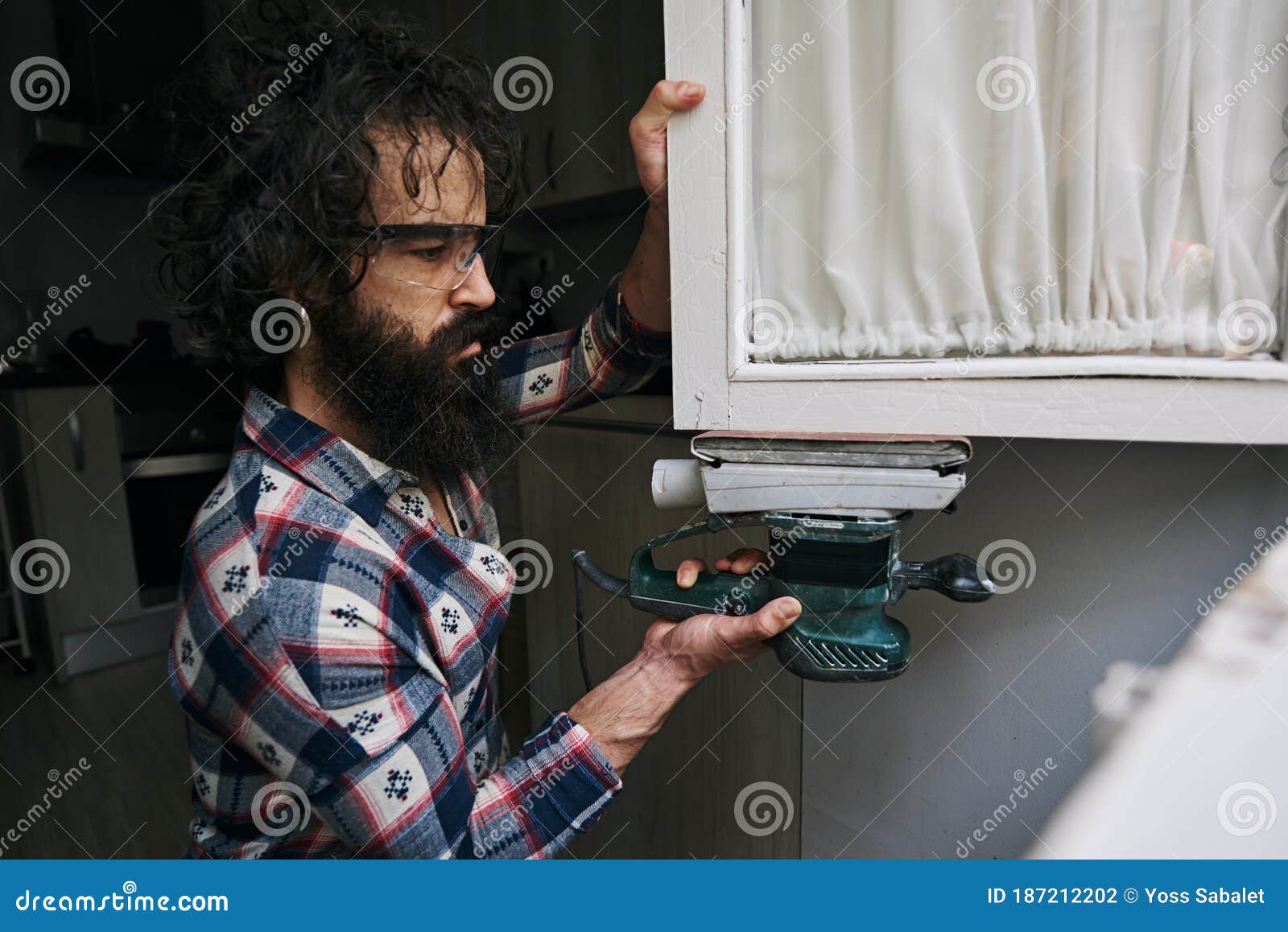 A young men using a sander stock photo. Image of manly - 187212202