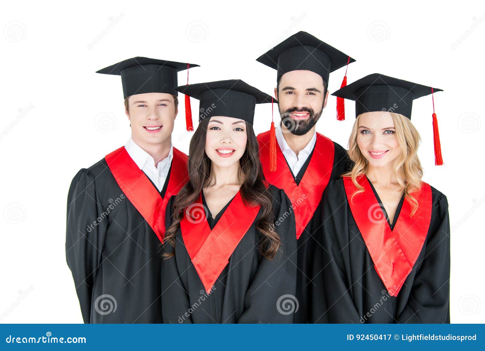 Young Men and Women in Graduation Caps Looking at Camera Stock Image ...