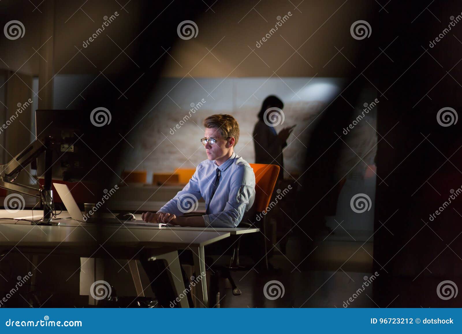 Man Working on Computer in Dark Office Stock Photo - Image of people ...