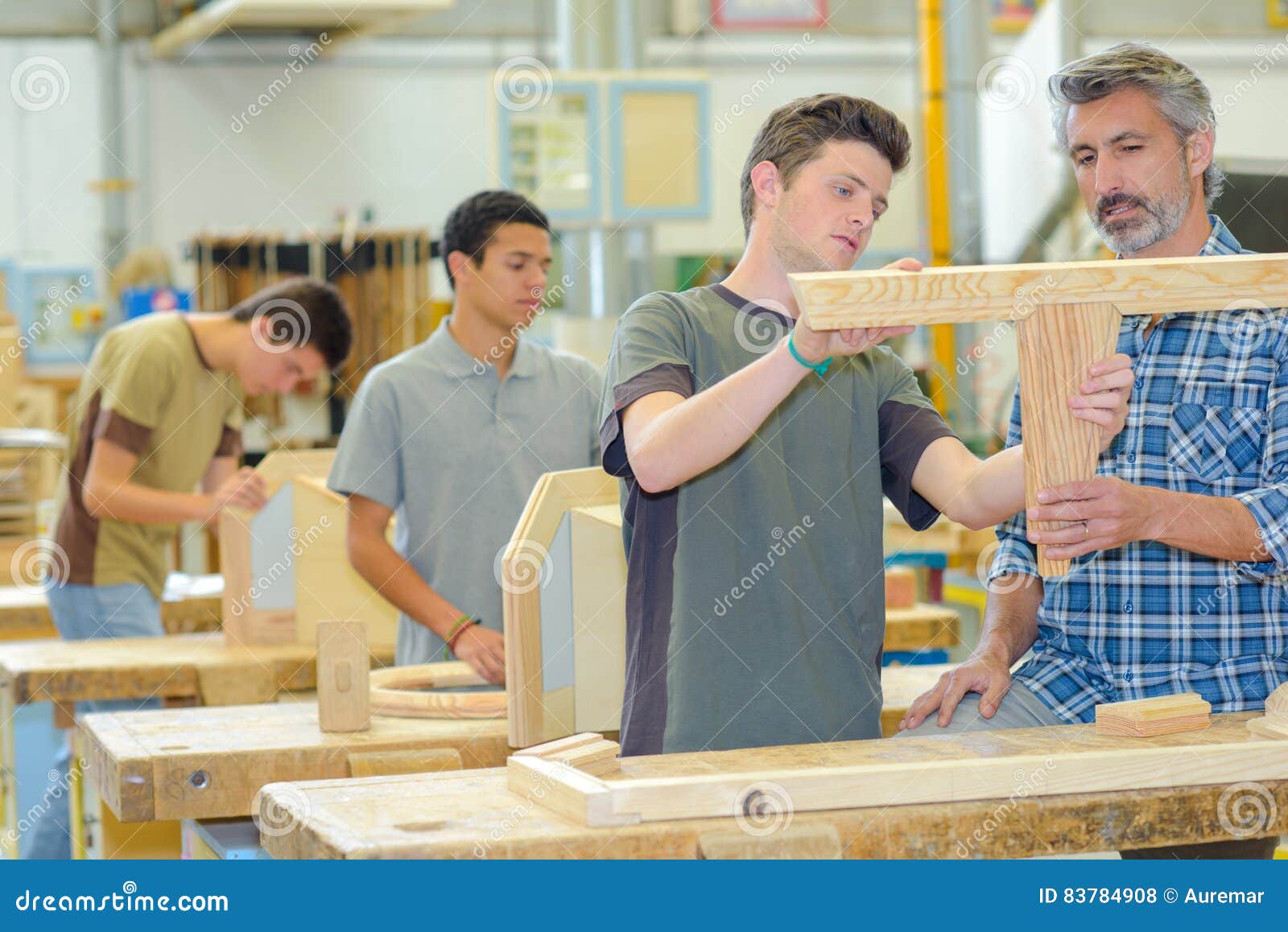 Young men in workshop stock photo. Image of design, youth - 83784908