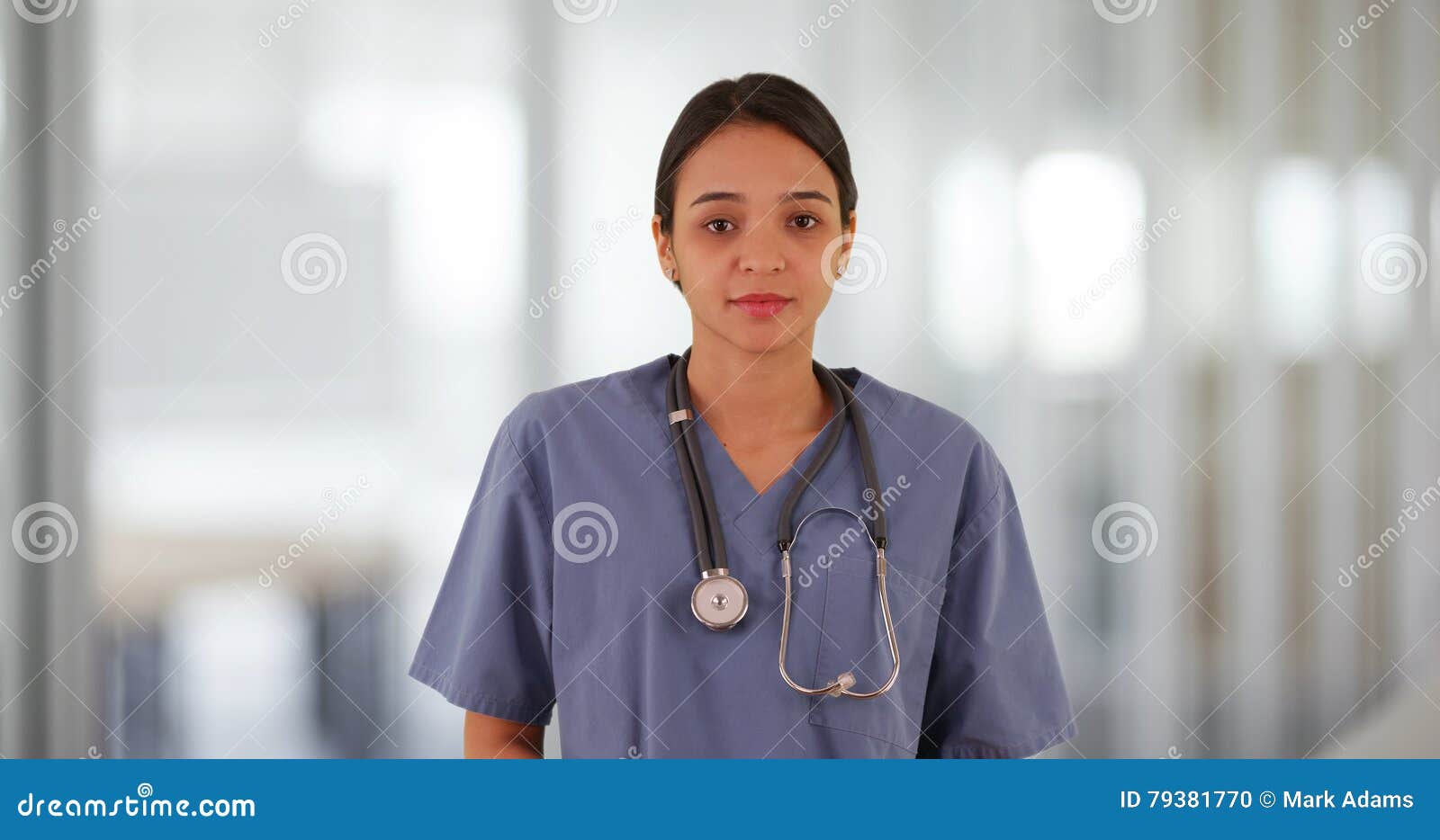 Young Mexican Nurse Standing in the Hallway Stock Photo - Image of ...