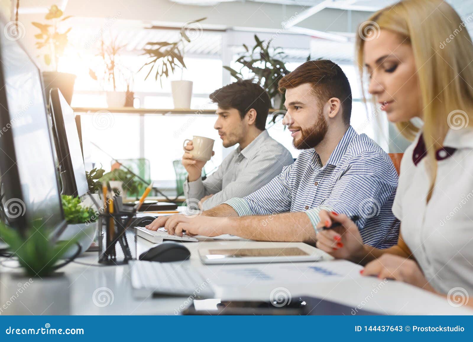 Young Millennial People Working on Computers at Coworking Stock Image ...